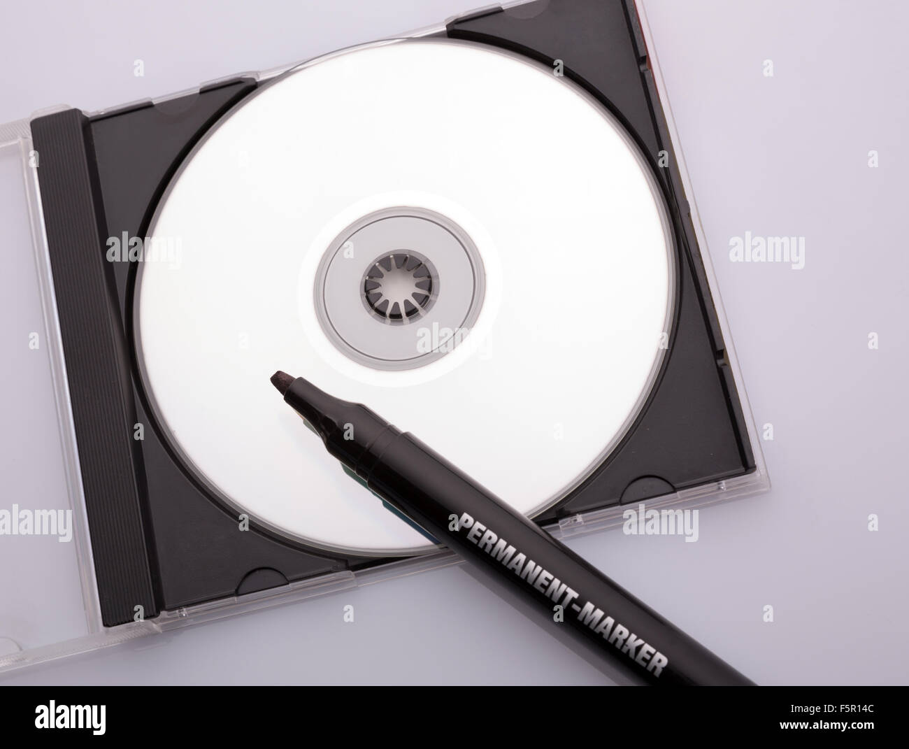 data disk concept on white background Stock Photo - Alamy