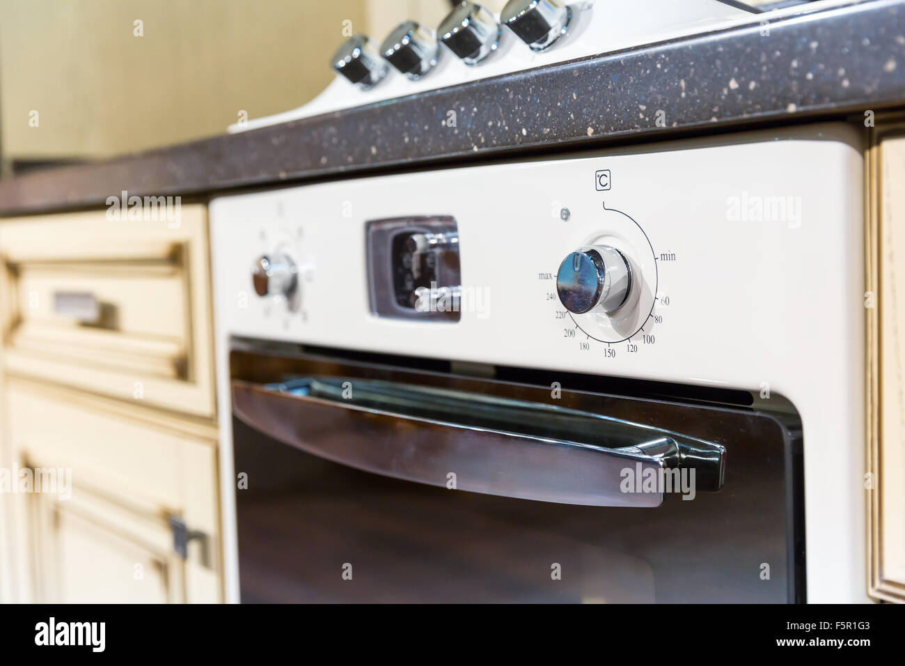 Closeup picture of white oven in kitchen interior design Stock Photo ...