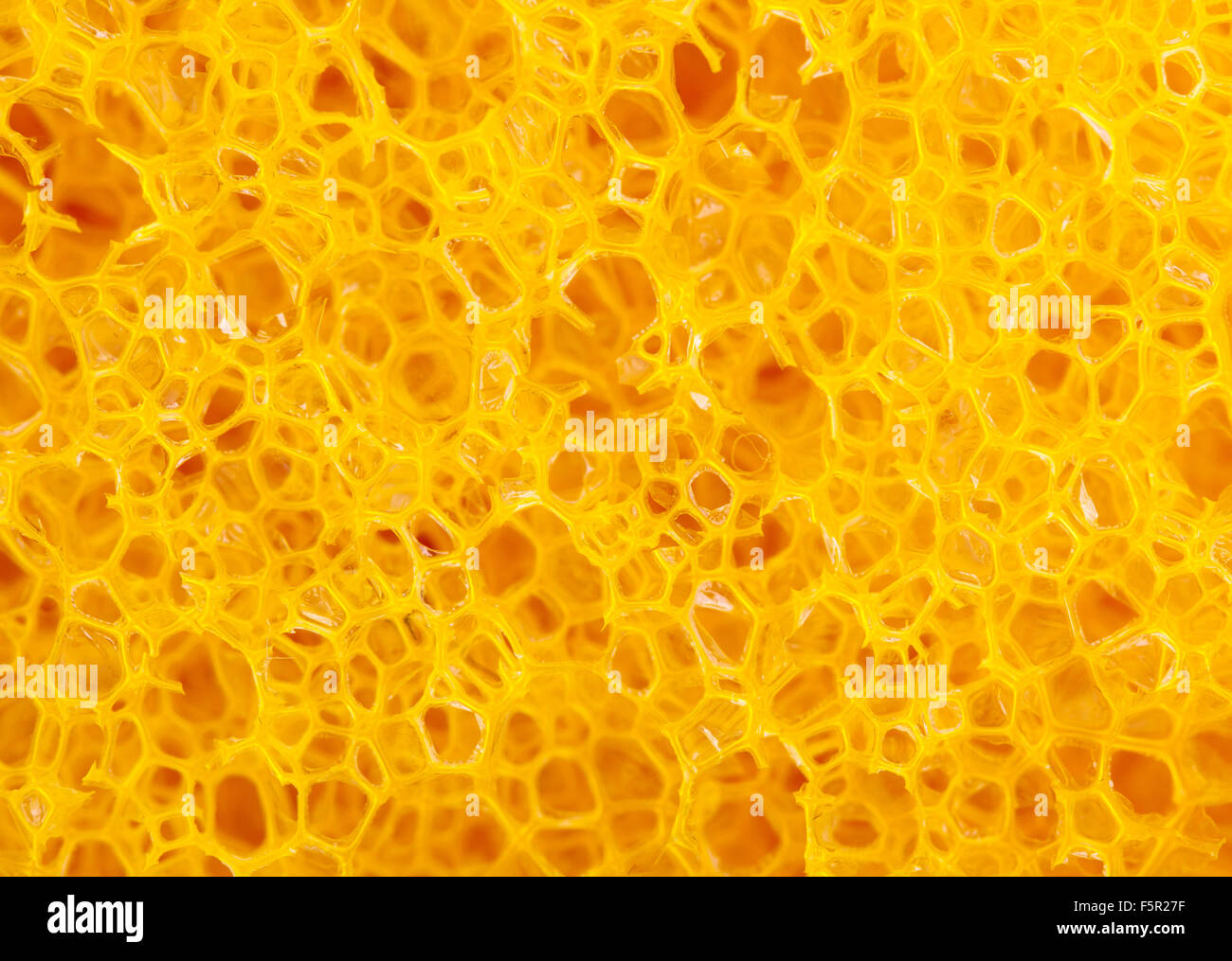 Close-up of yellow cleaning sponge. Background or texture Stock Photo ...