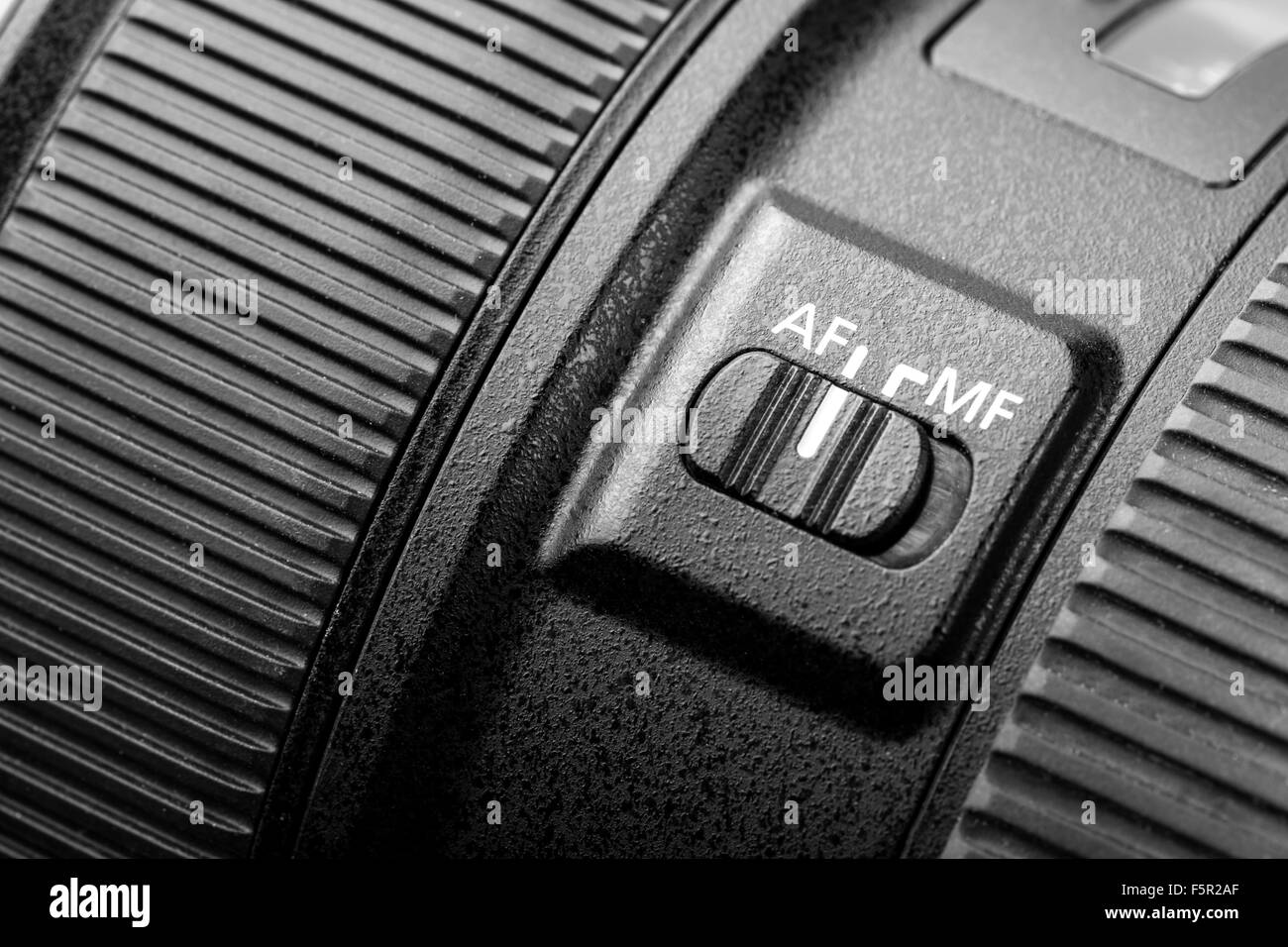 A closeup view of focus switch on the lens Stock Photo - Alamy