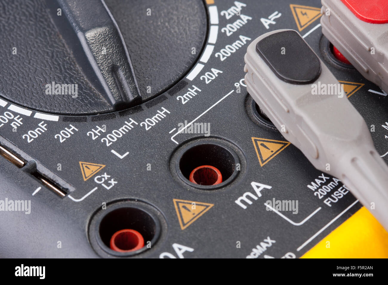 Close-up of a digital multimeter measurement sockets Stock Photo - Alamy