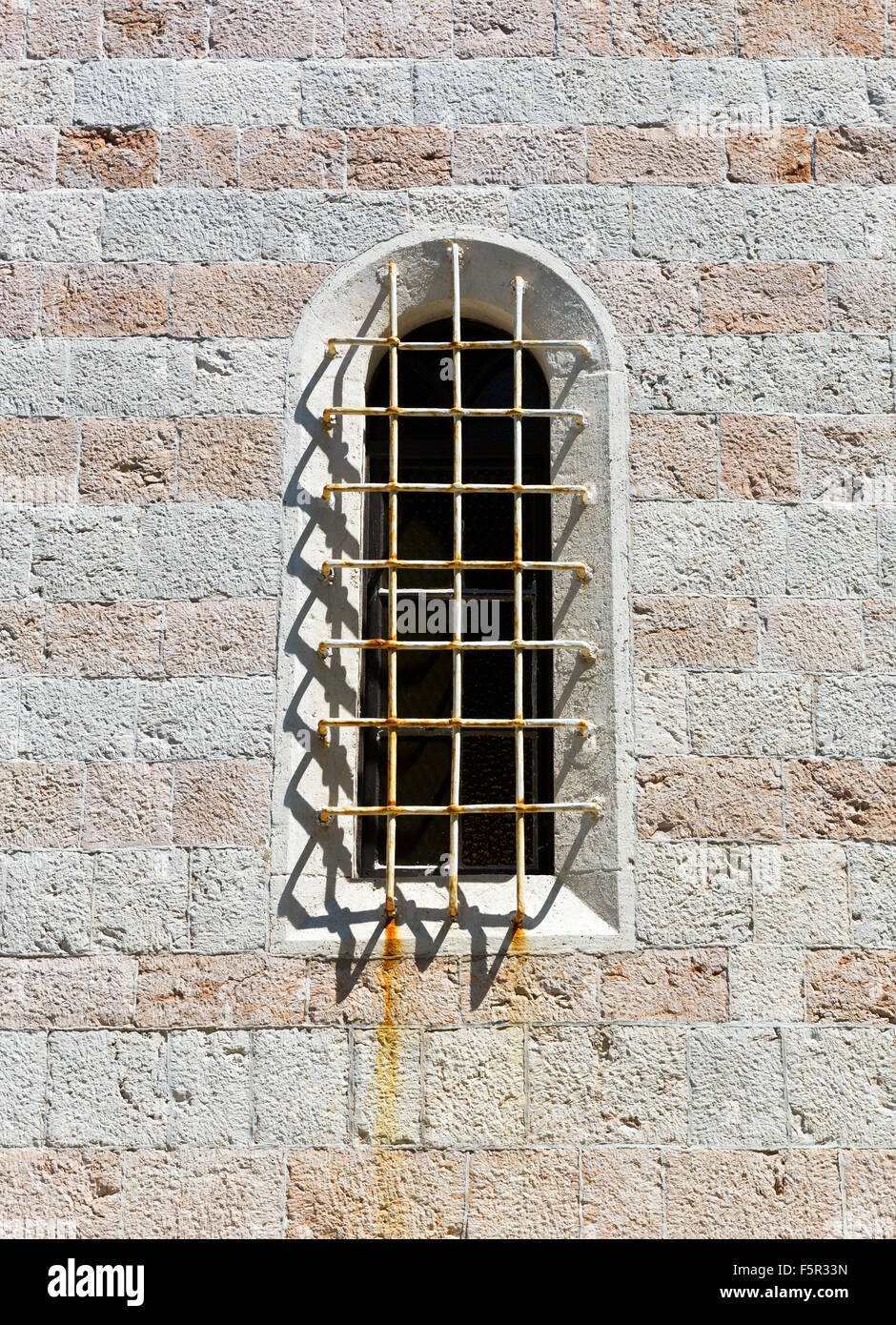 Long arched old window in a stone wall Stock Photo - Alamy
