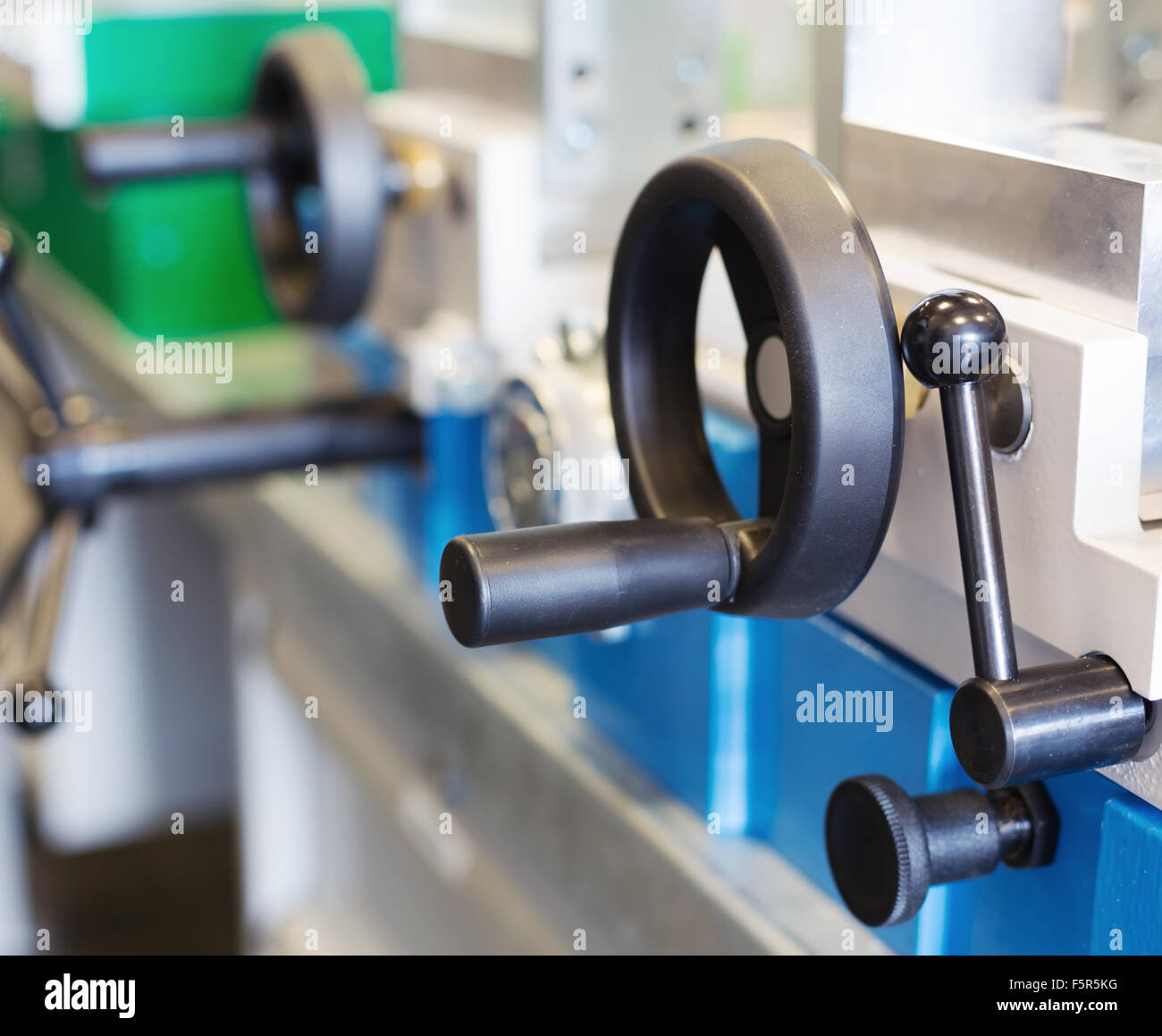 Lever of machine at workroom Stock Photo - Alamy