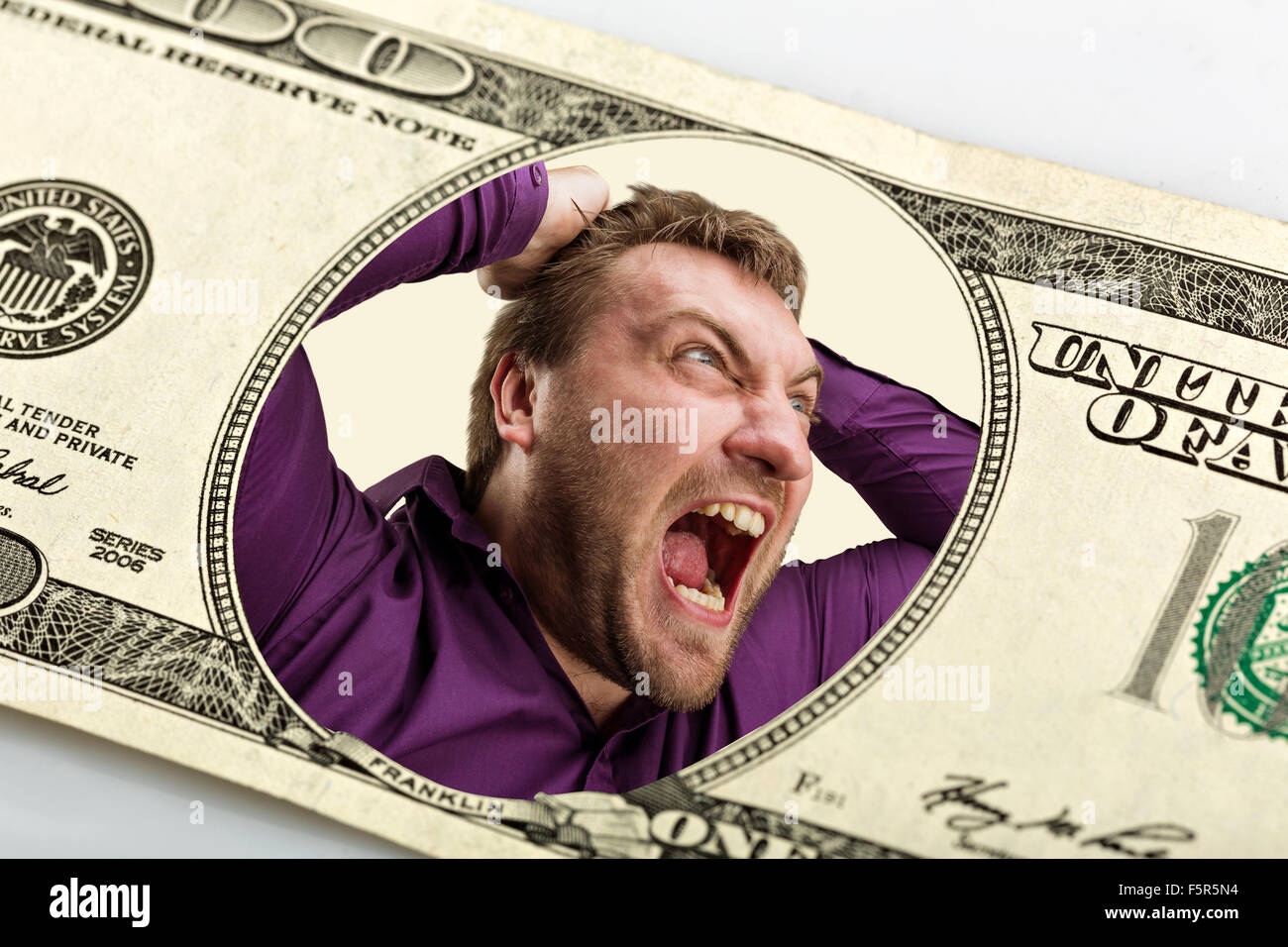 Mad man on the dollar banknote crying Stock Photo - Alamy