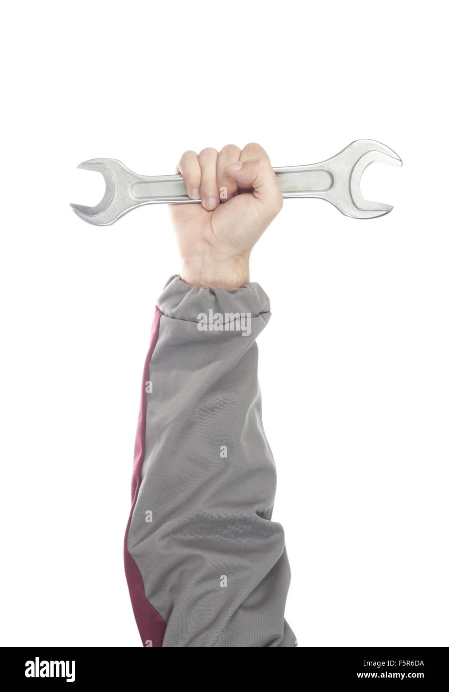 Repairman hand with wrench isolated on white Stock Photo - Alamy