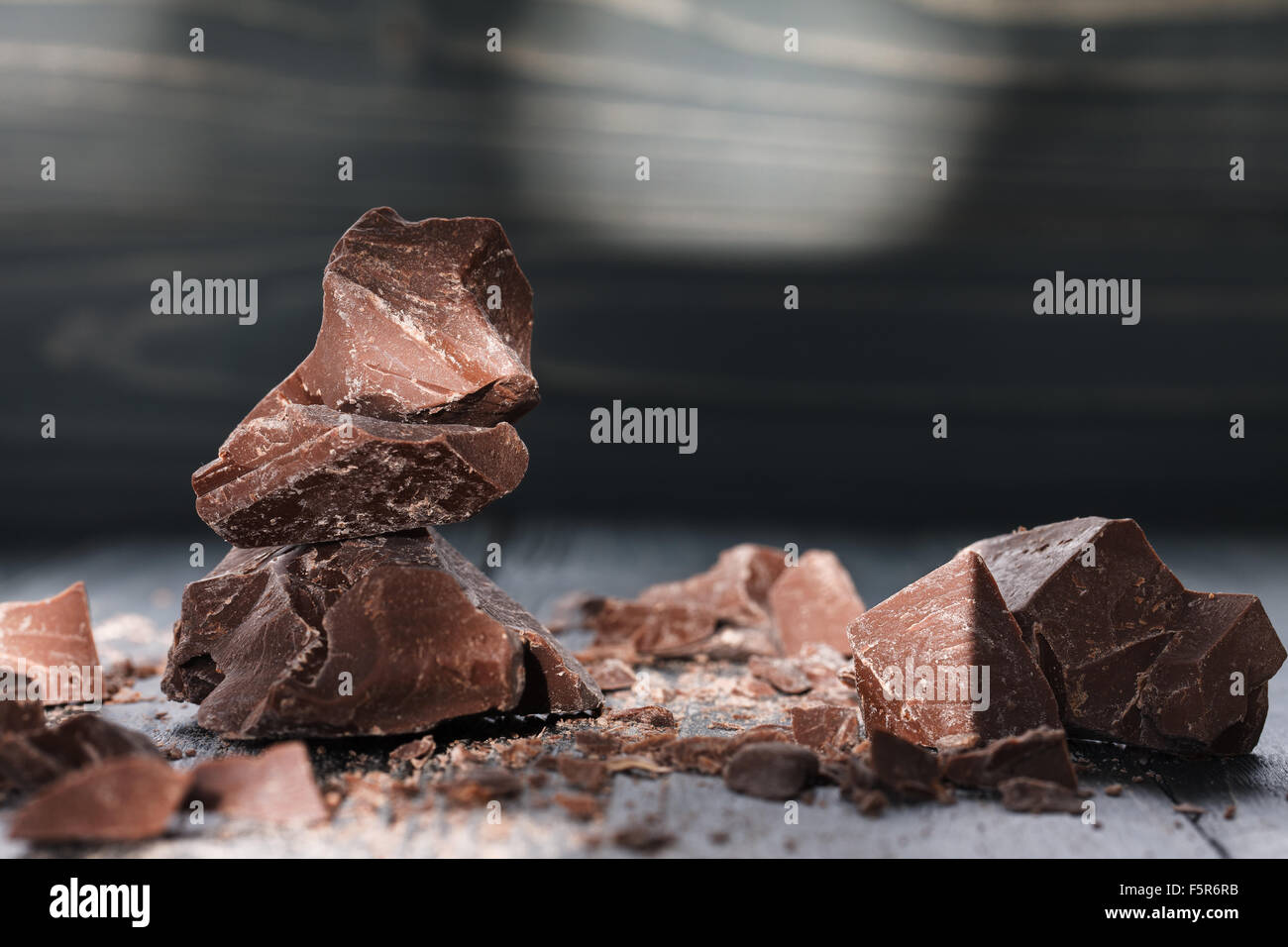 Chocolate pieces on a dark backround Stock Photo - Alamy