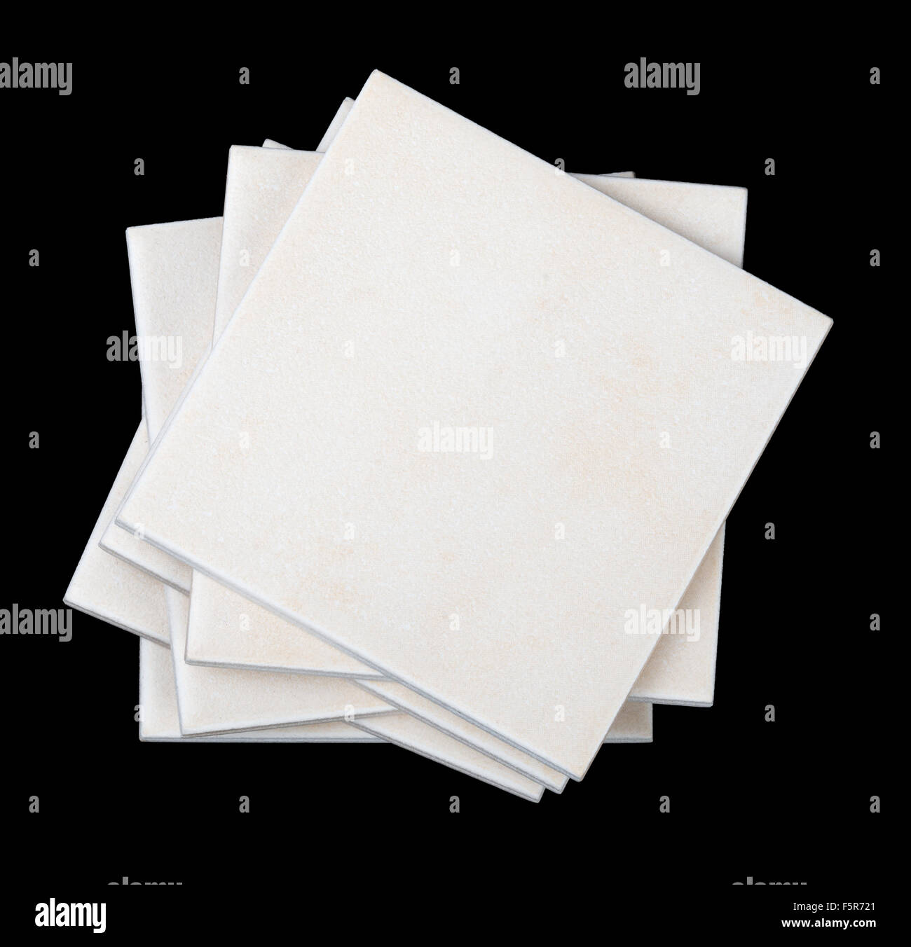 Stack of tiles on black, top view Stock Photo - Alamy