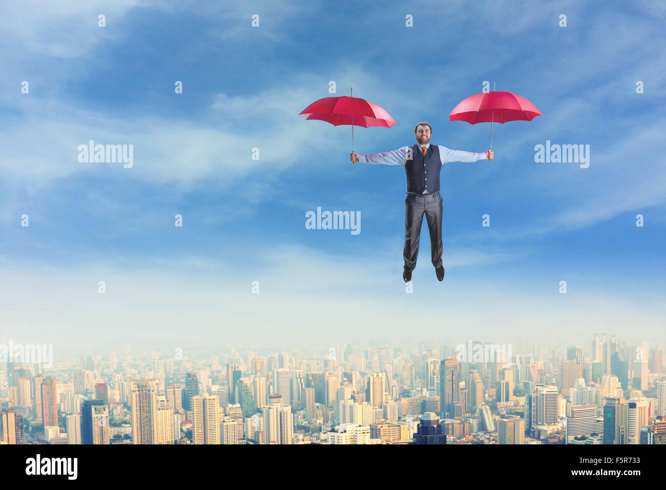 Red flying suit hi-res stock photography and images - Alamy