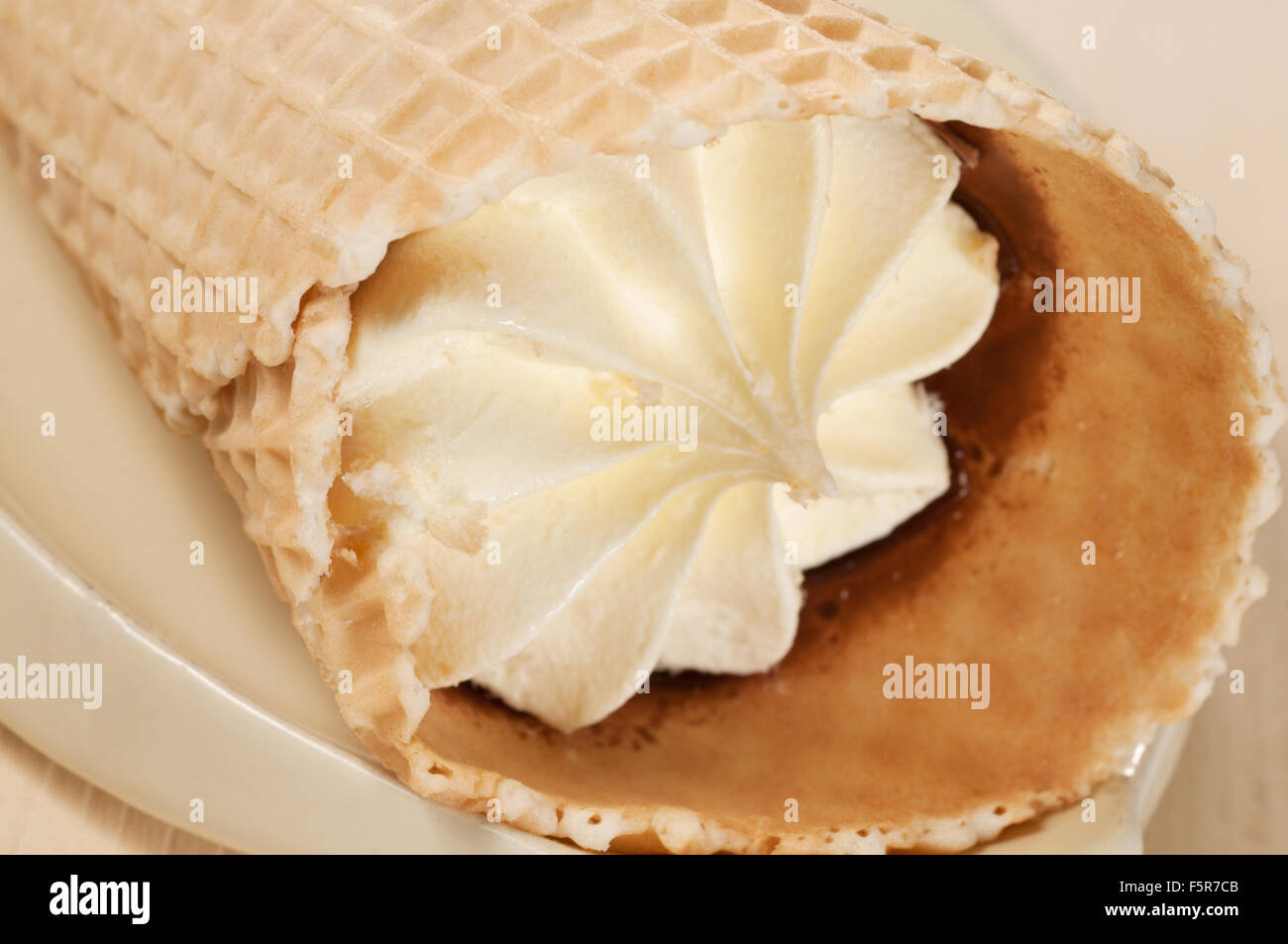 Ice-cream wafer cone with chocolate, closeup Stock Photo - Alamy