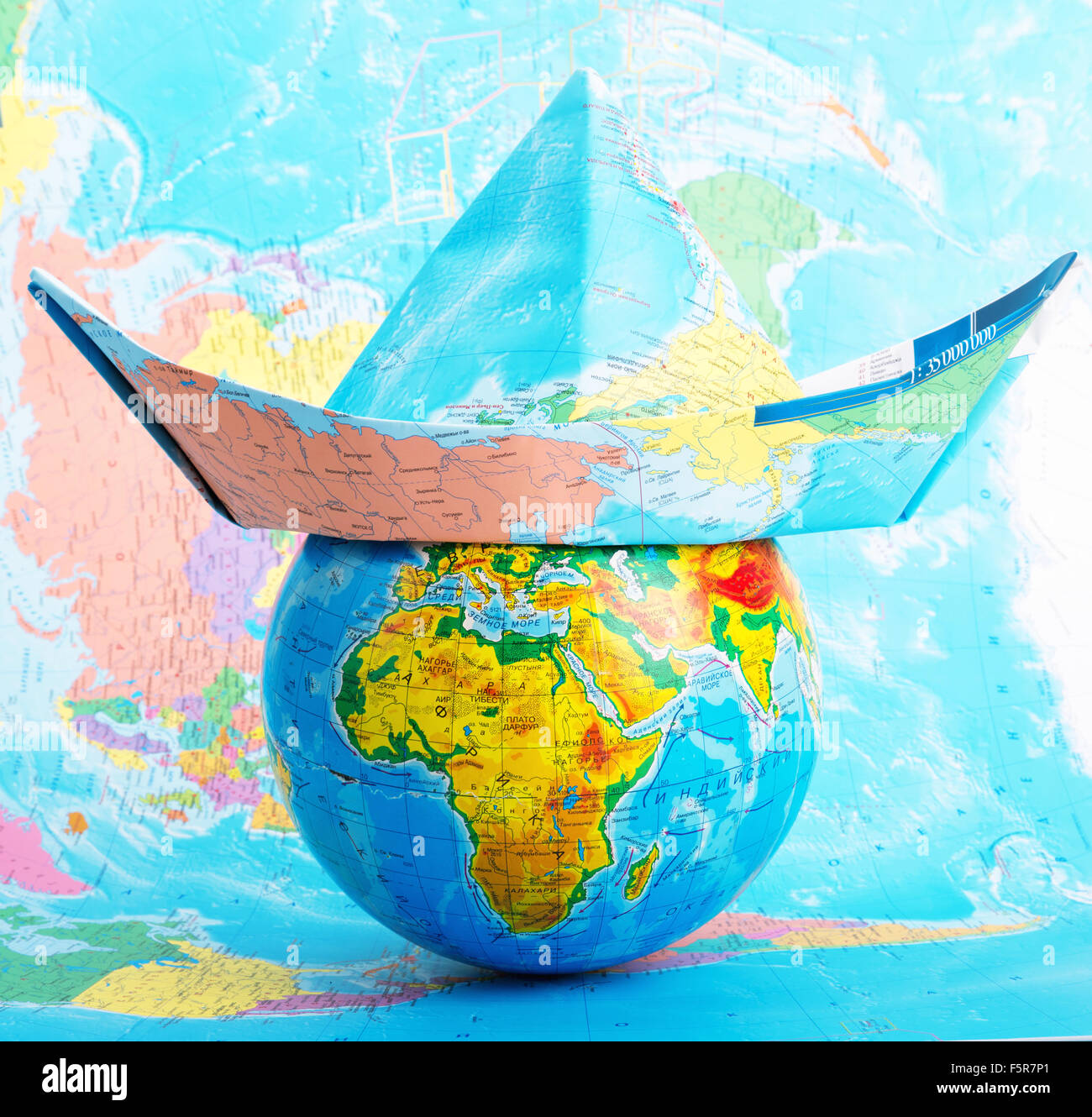 Closeup of globe with hat from map Stock Photo - Alamy