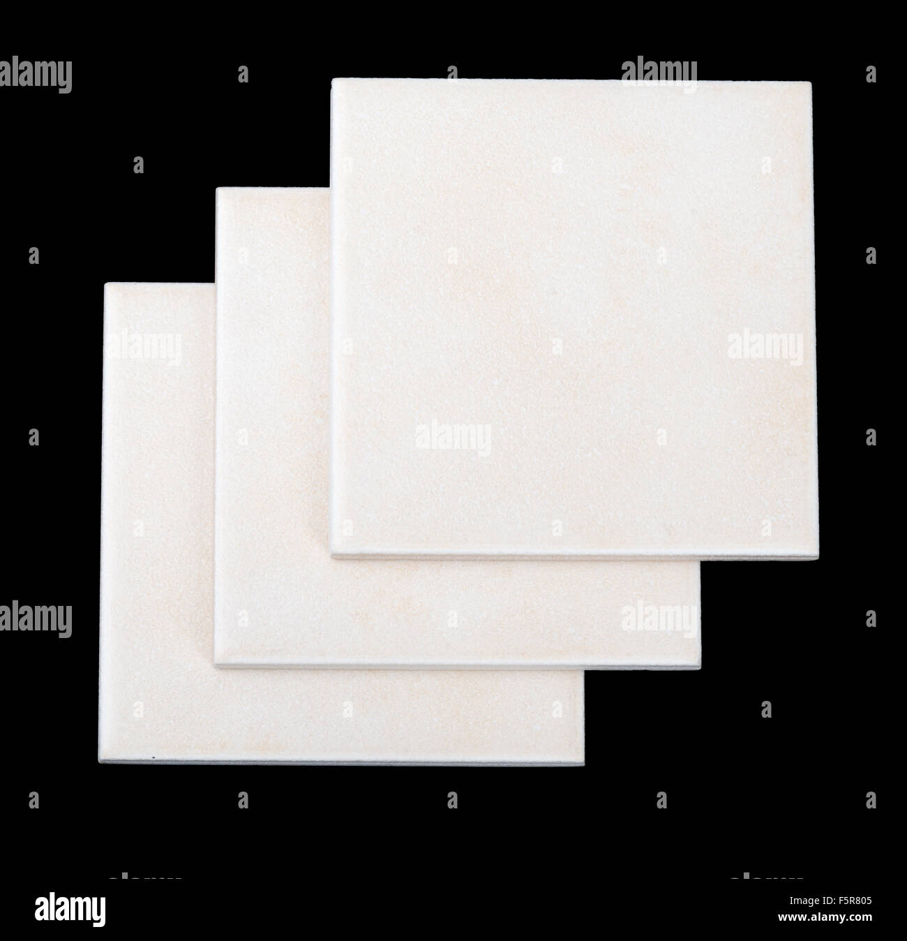 Pile of tiles on black background, top view Stock Photo - Alamy