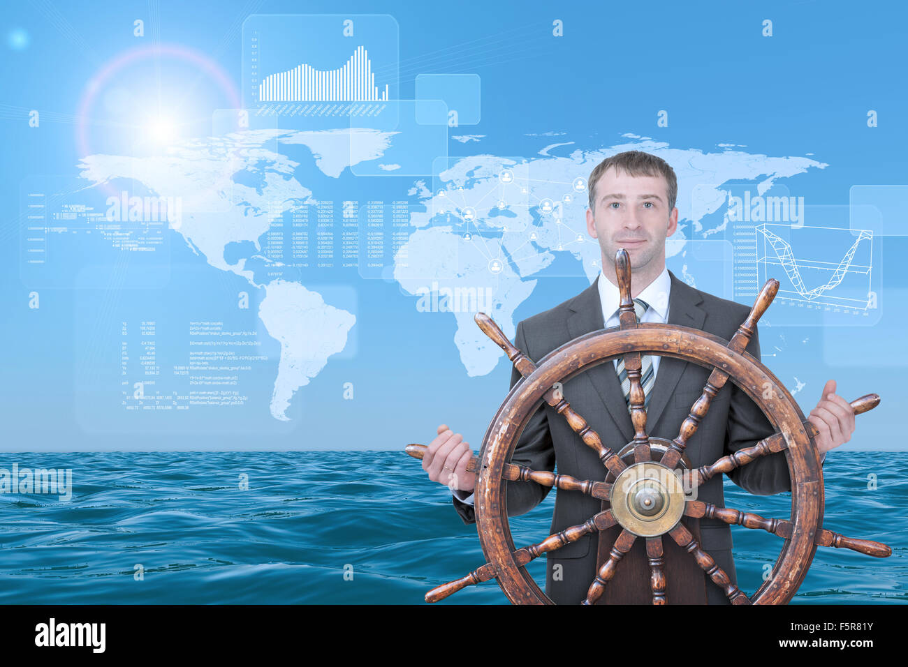 Smiling man with steering wheel and sea Stock Photo - Alamy