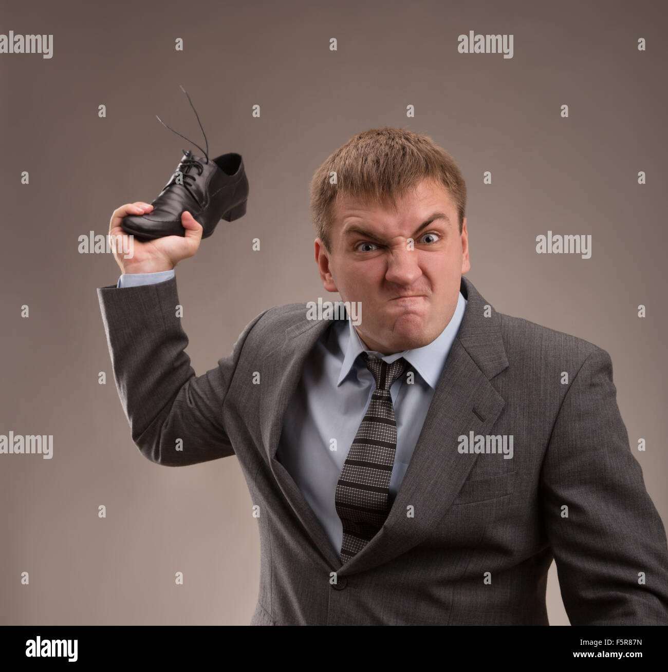 Aggressive office worker put up a fight Stock Photo - Alamy