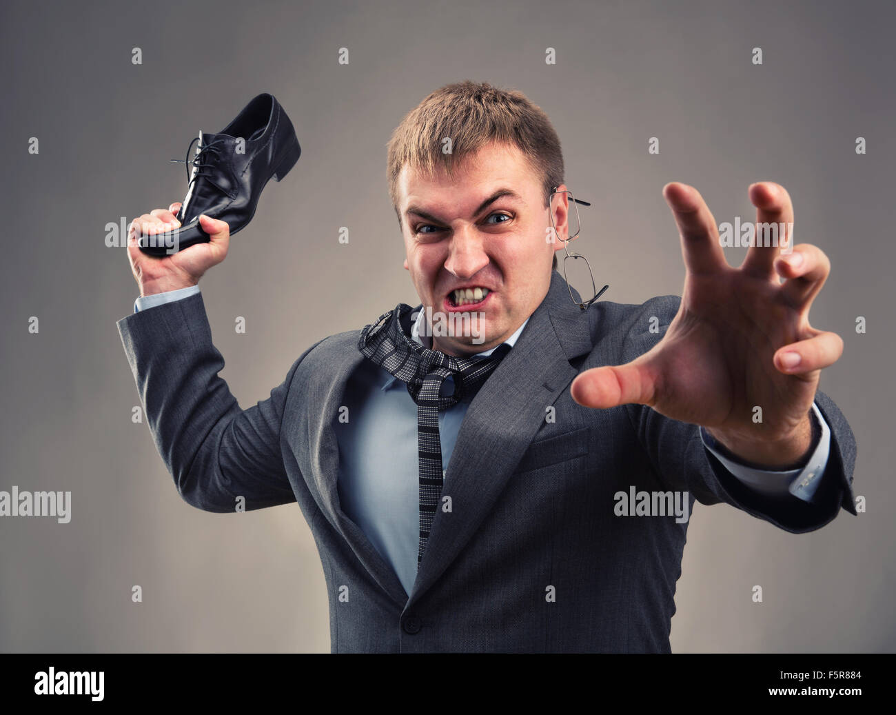 Aggressive office worker put up a fight Stock Photo - Alamy