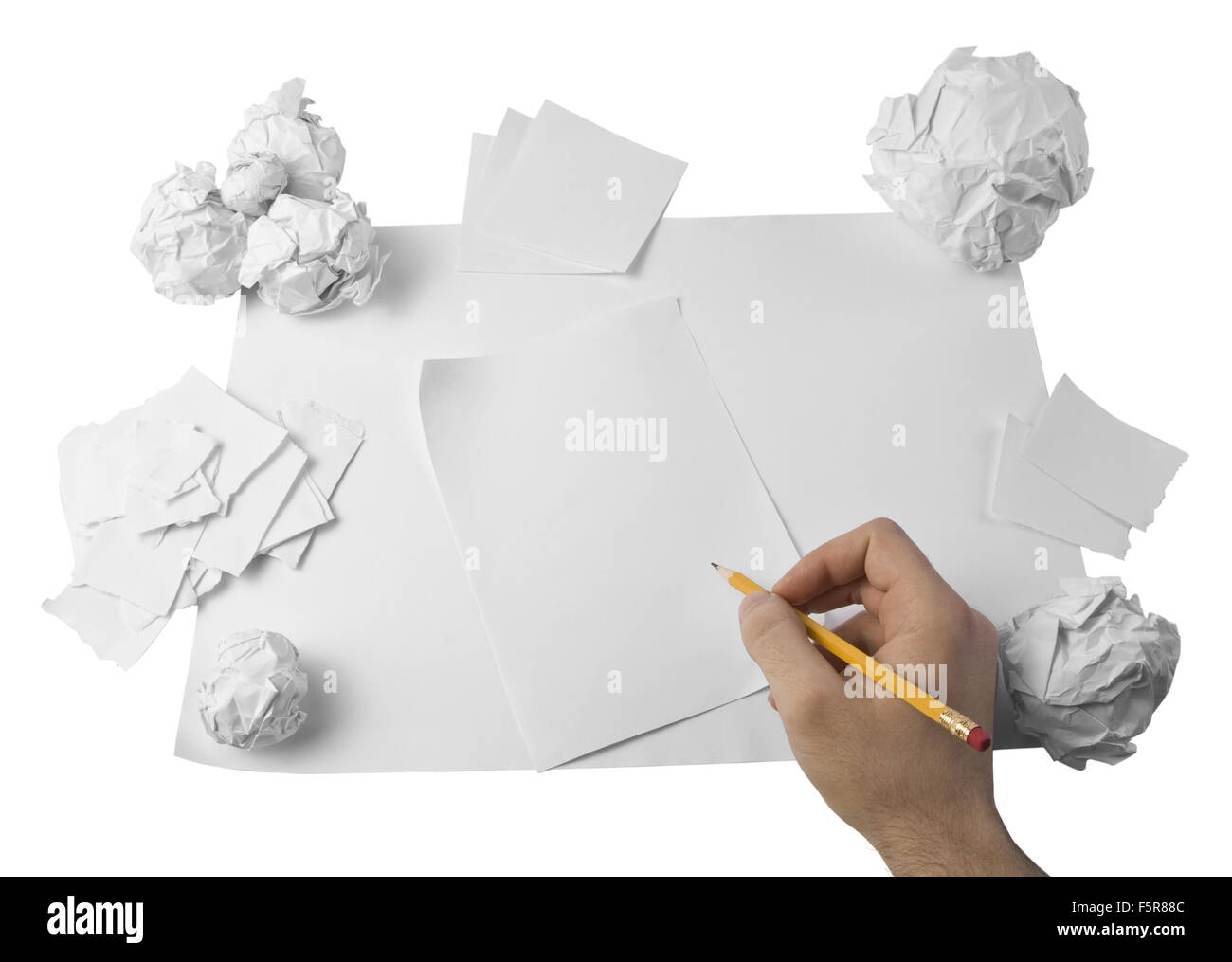 Workspace with crushed paper and hand isolated on white Stock Photo - Alamy