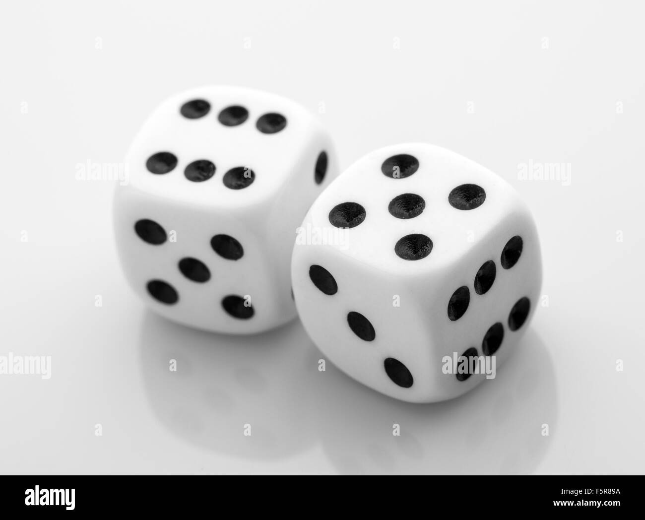 Two dice Black and White Stock Photos & Images - Alamy