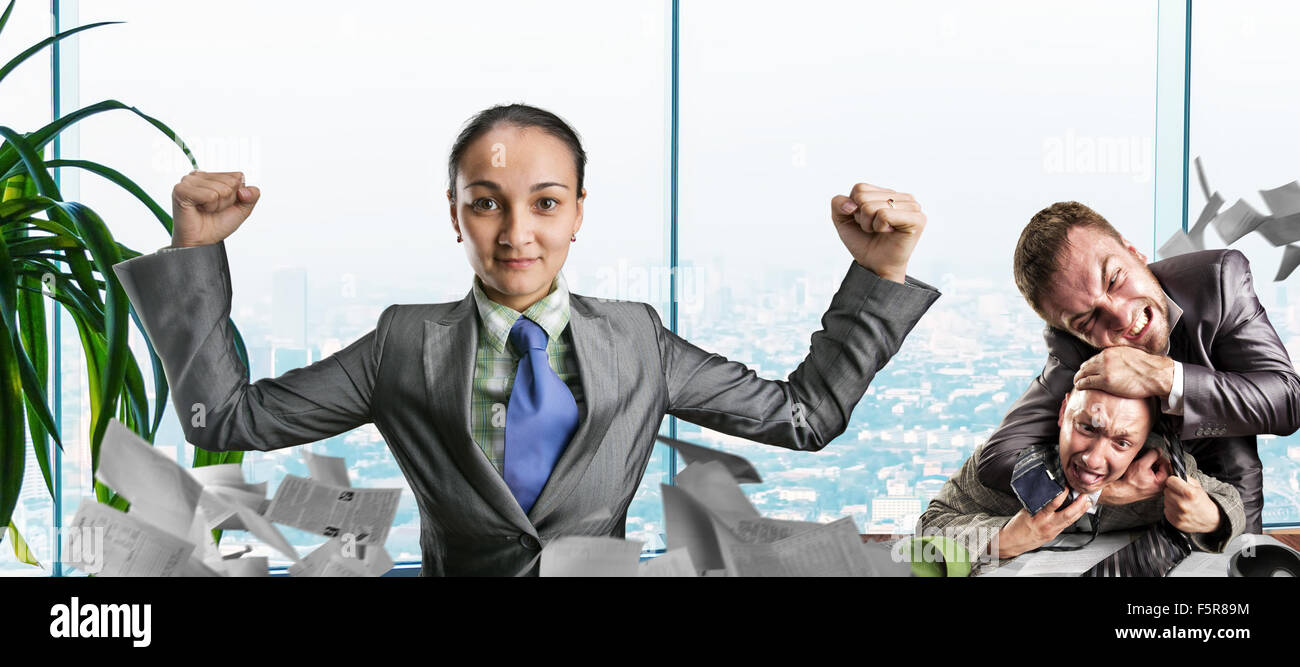 Strong business woman thinking about fighting in the office Stock Photo ...