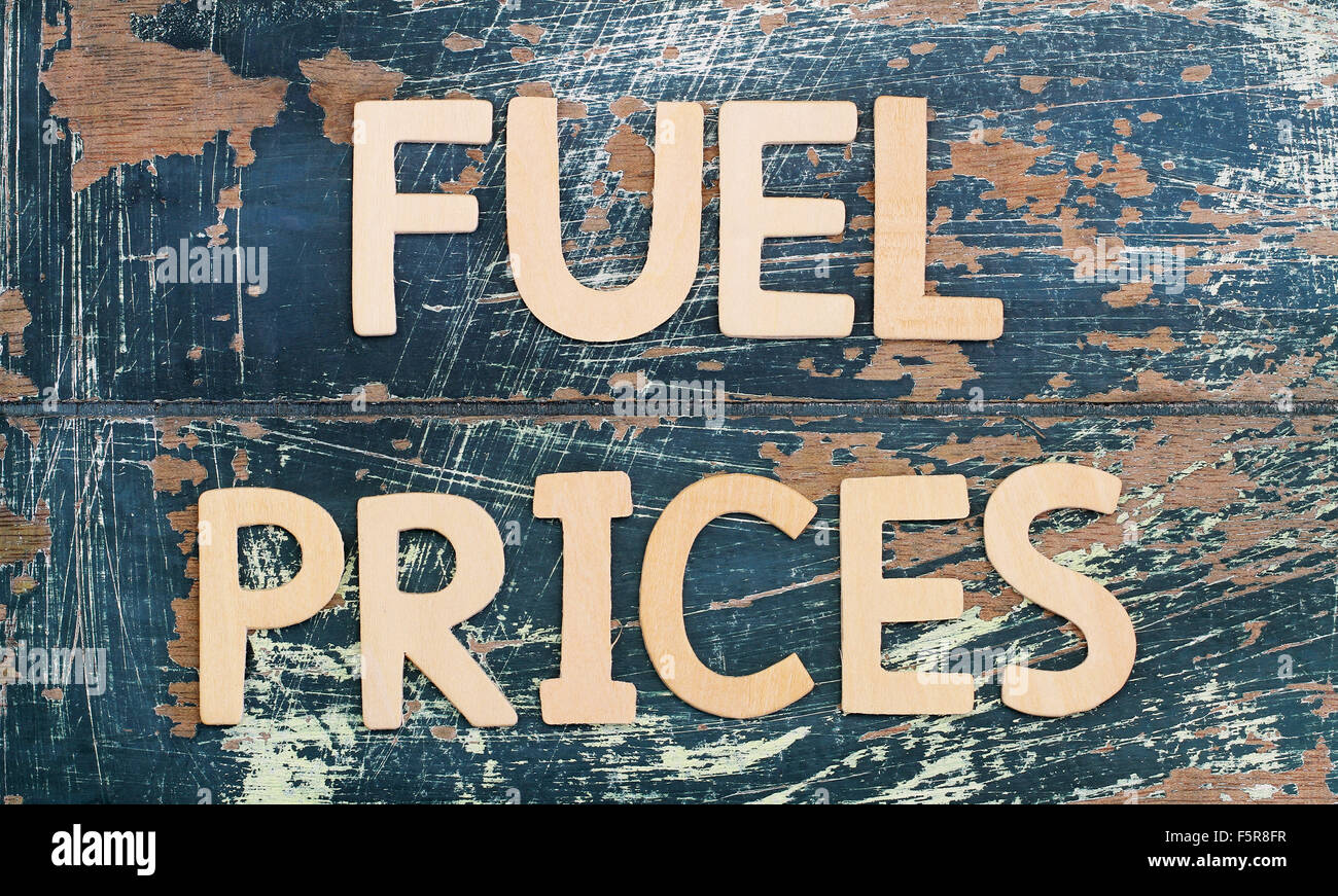 Fuel prices written with wooden letters on rustic surface Stock Photo ...