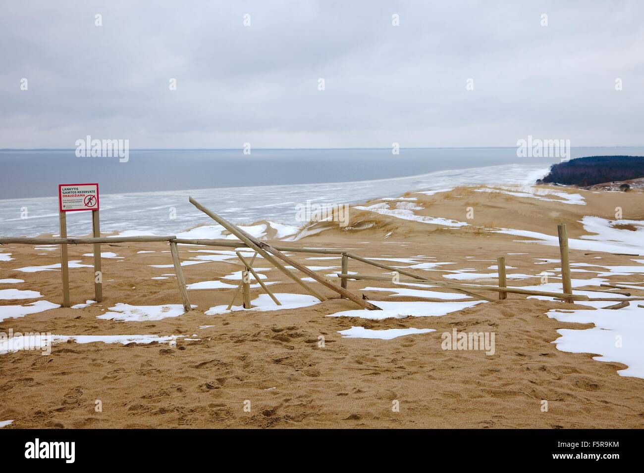 Sand Dunes With Snow Stock Photo - Alamy