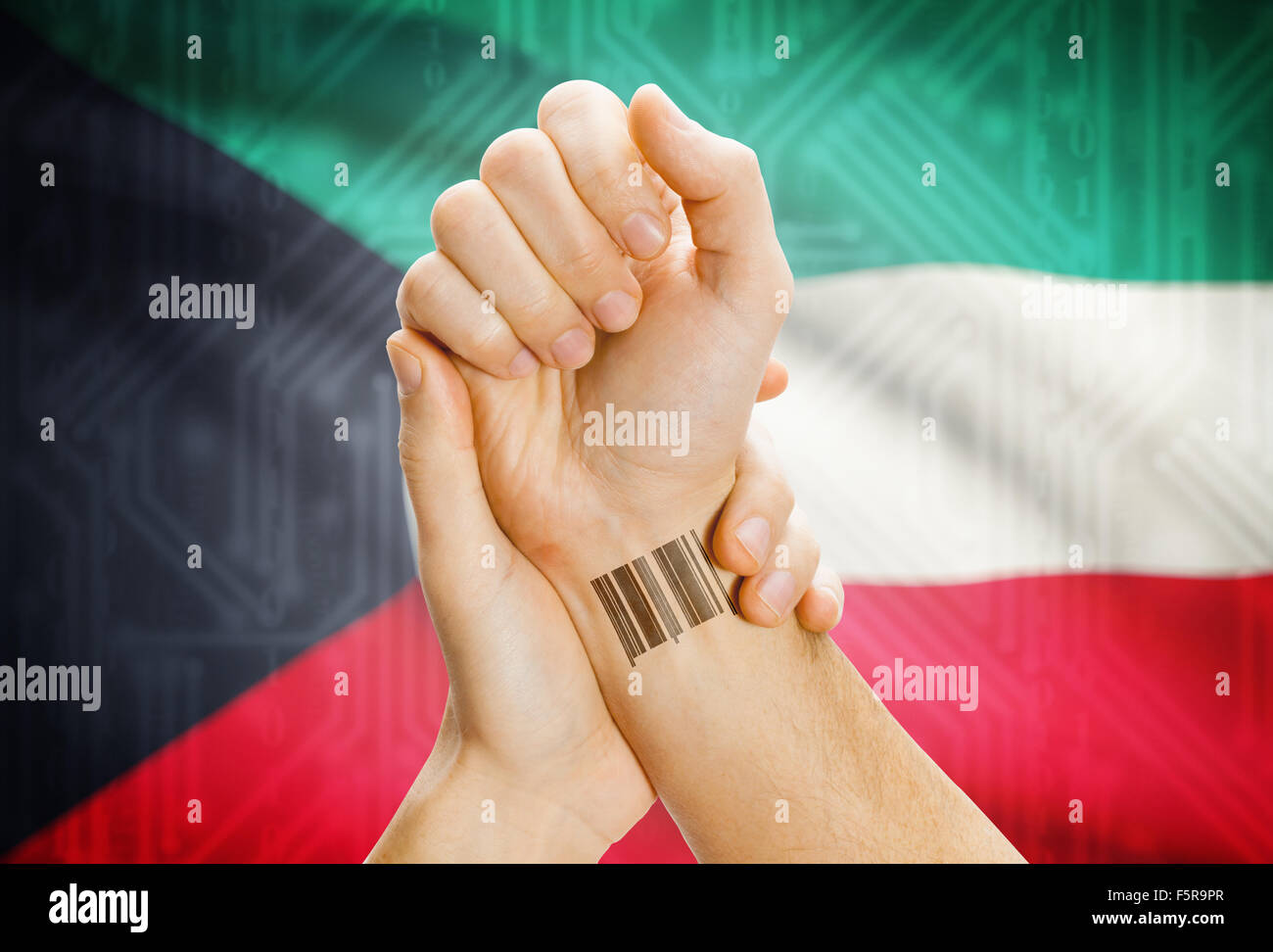 Barcode ID number on wrist of a human and national flag on background ...