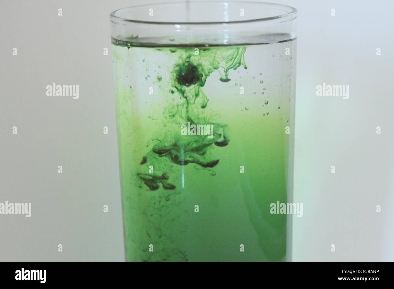 green dye in water Stock Photo - Alamy