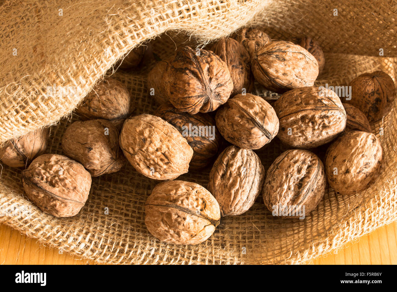 Ripe walnuts in a jute sack Stock Photo - Alamy