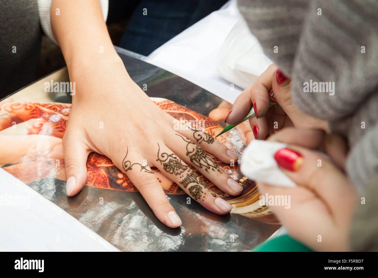 Saint-Petersburg, Russia - July 19, 2015: Brown henna or mehndi ...