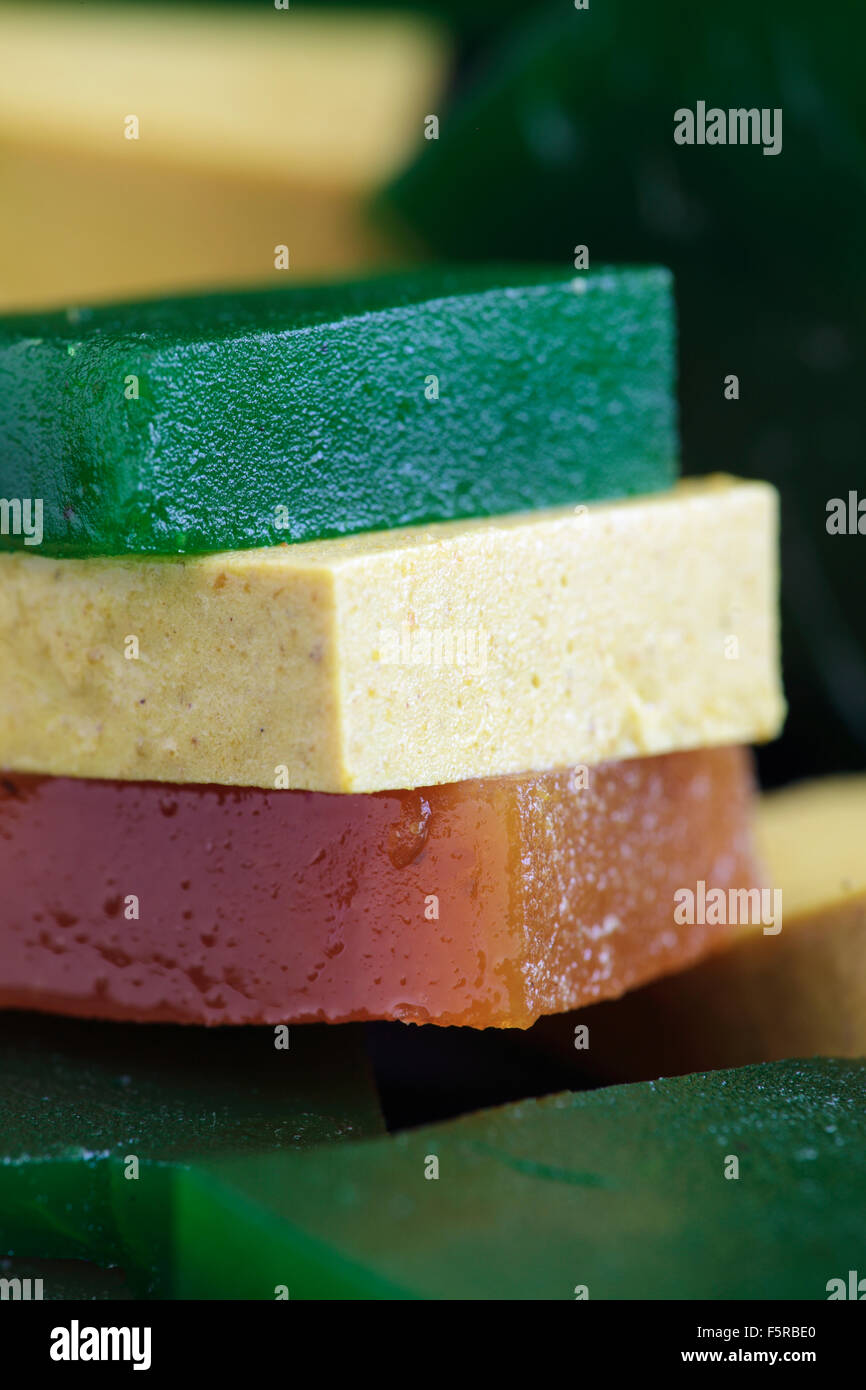 Slices of "ate", a fruit paste candy traditional to Morelia, Michoacan ...