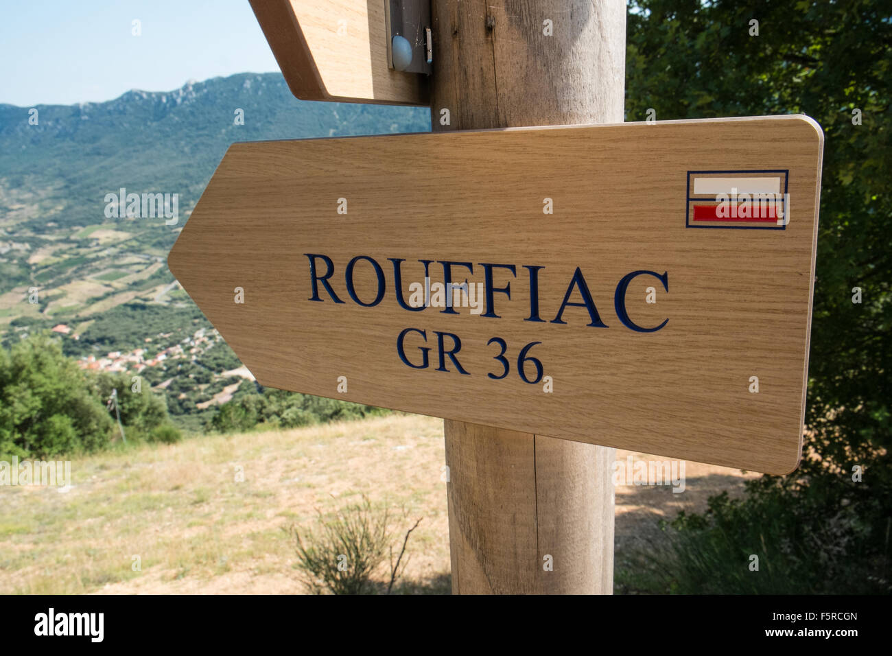 At Duilhac, local finger post marking Grande Route to Galamus at base ...