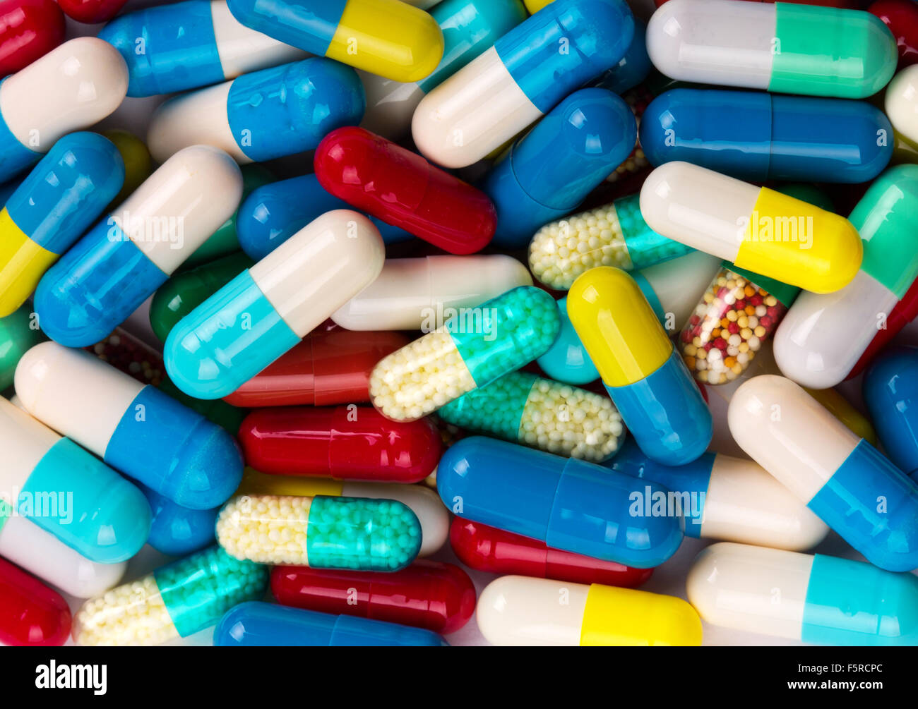 Many colorful medicines. Background or texture Stock Photo - Alamy