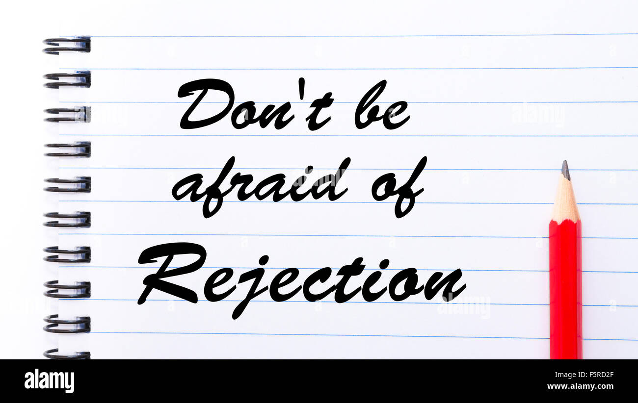 Don't Be Afraid Of Rejection written on notebook page, red pencil on ...