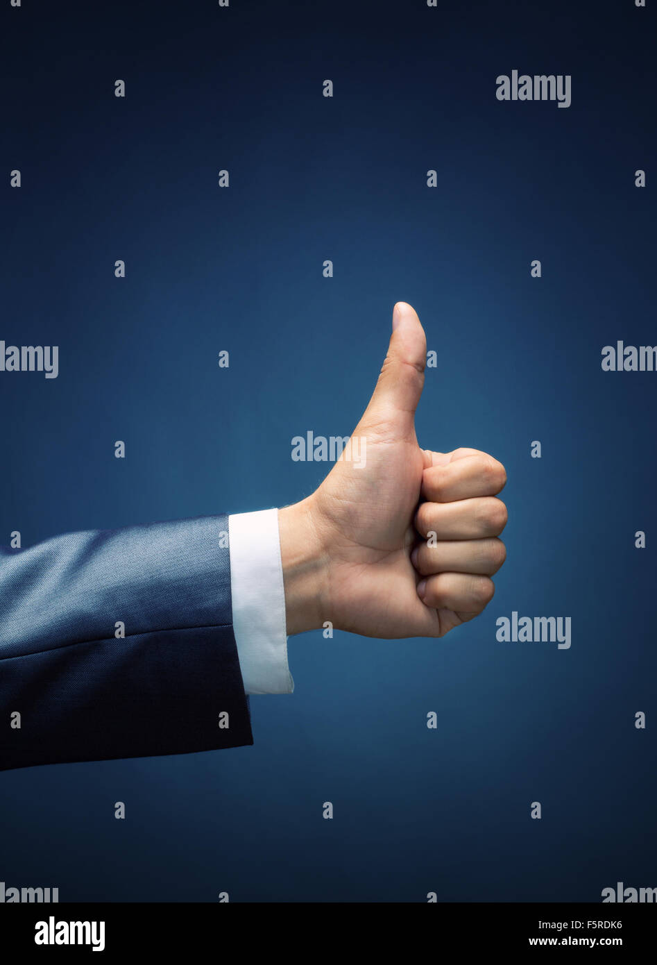 Closeup of thumbs up symbol Stock Photo - Alamy