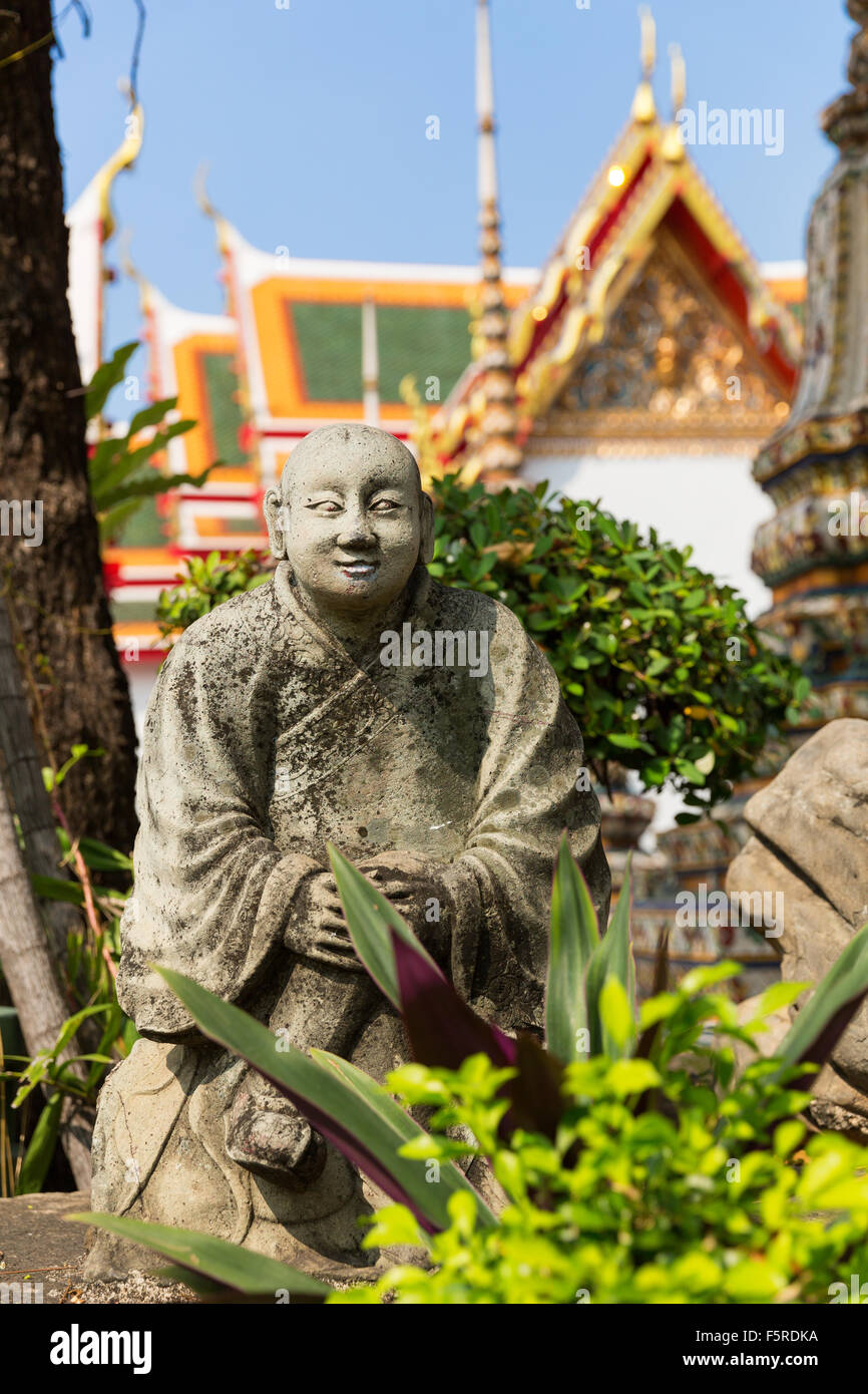 Stone monk statue in garden (Wat Po Temple Stock Photo - Alamy