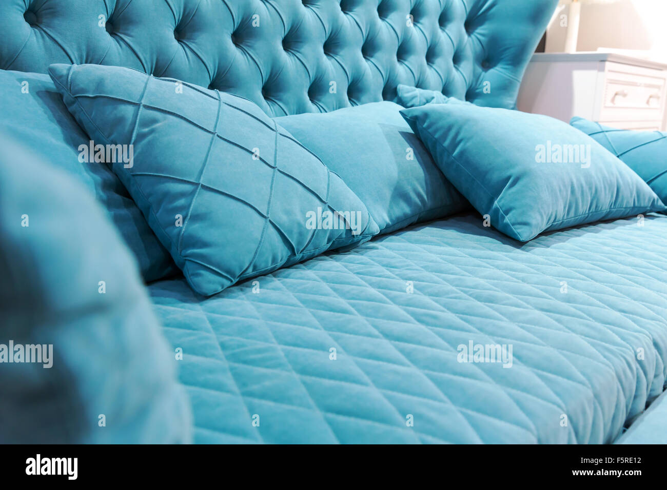 Closeup of a modern blue sofa Stock Photo - Alamy