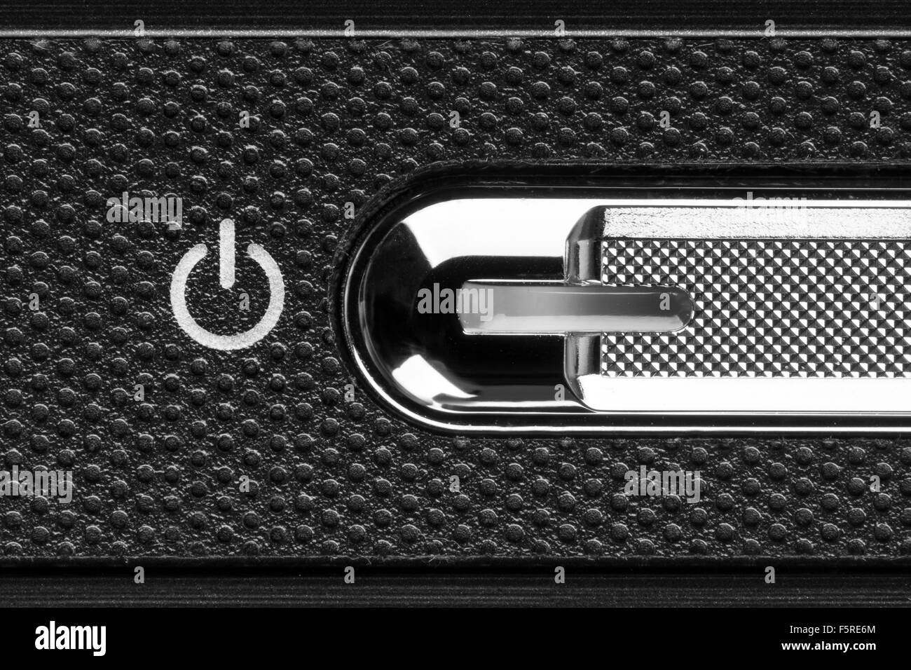 Close-up of power button on laptop Stock Photo - Alamy