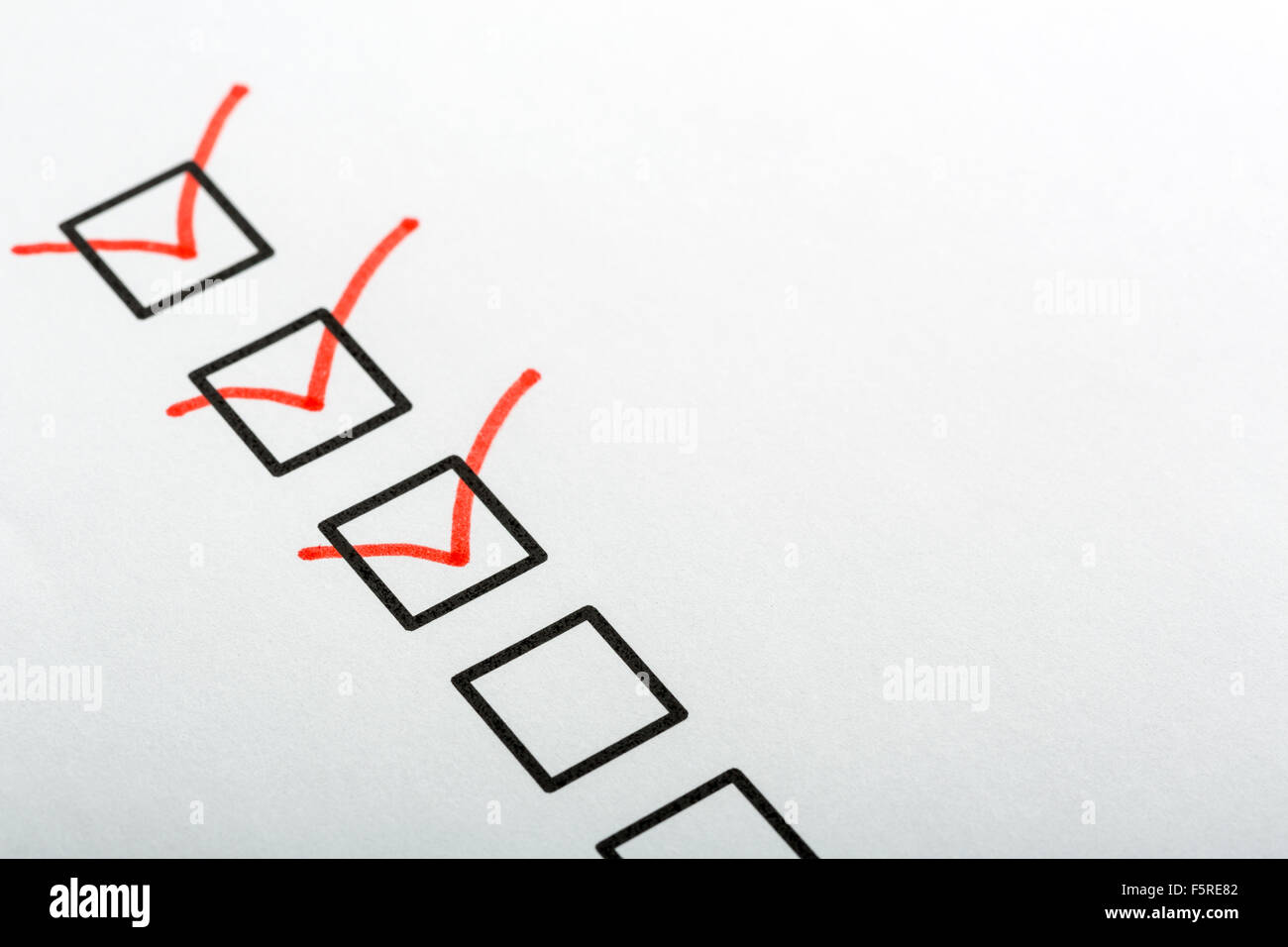 Check boxes on white background Stock Photo - Alamy