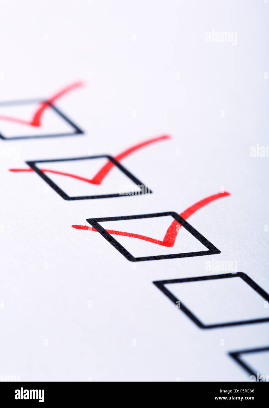 Closeup of check boxes on white background Stock Photo - Alamy