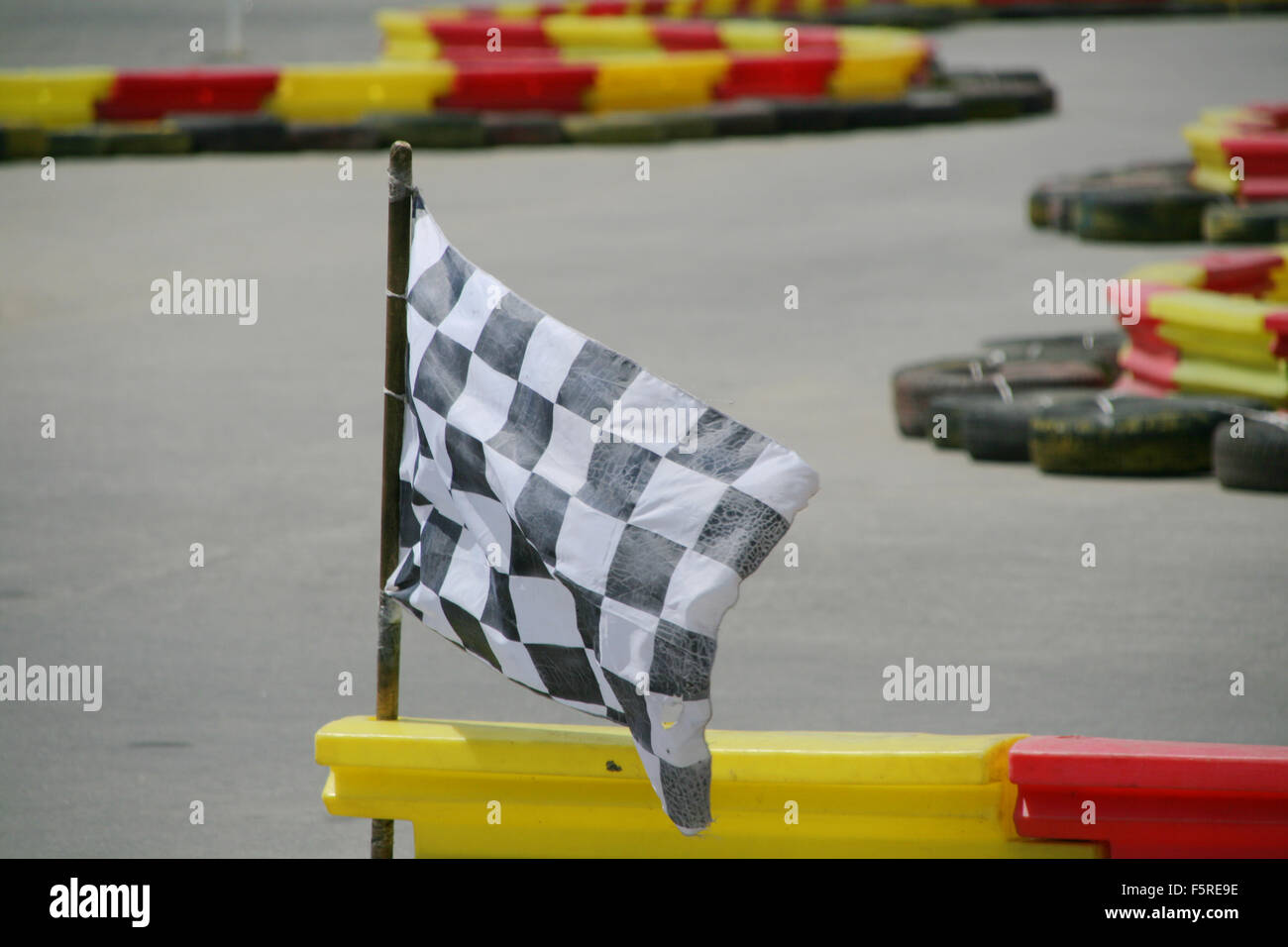 Checkered flag in rally track Stock Photo - Alamy
