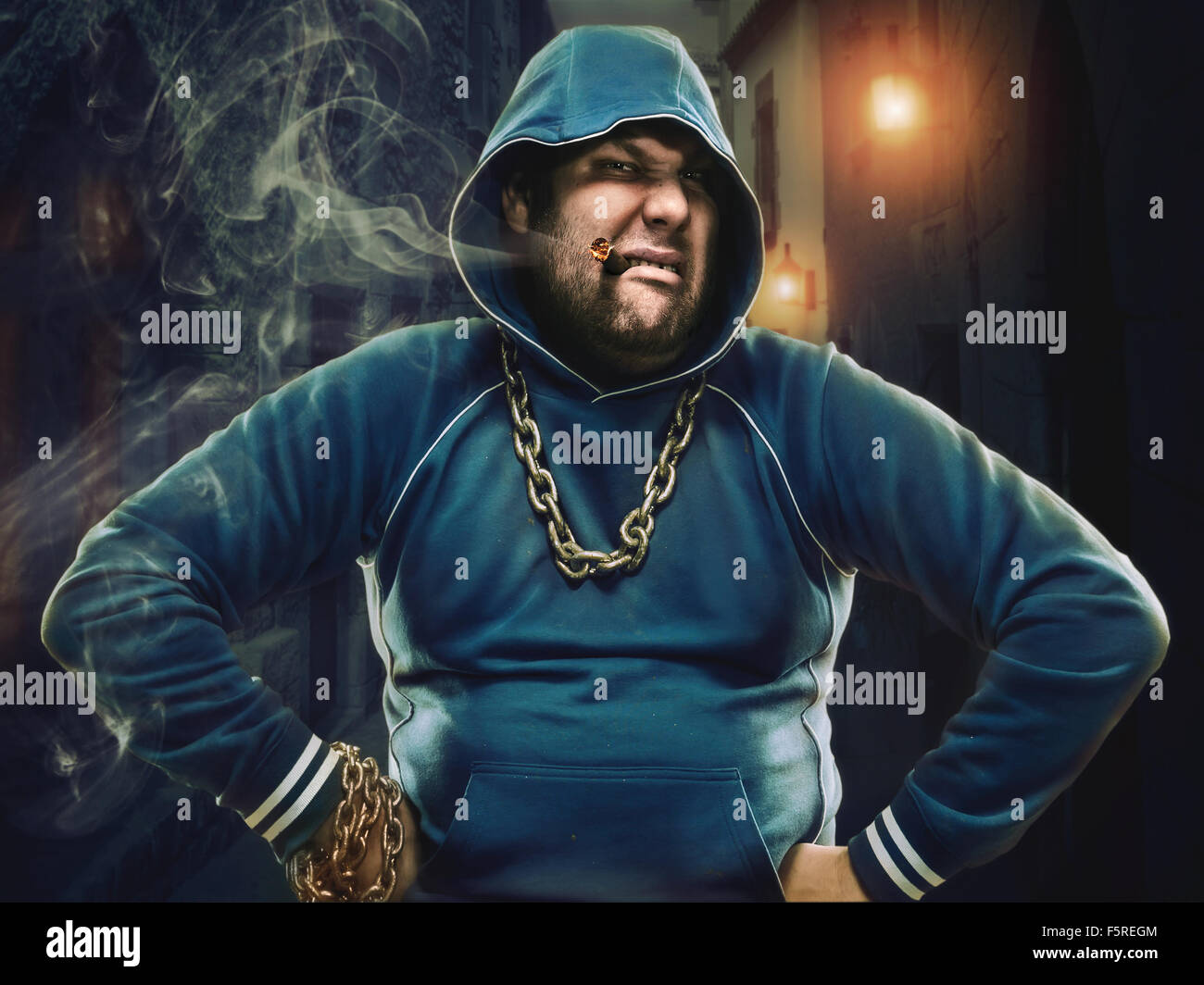 Angry man with a cigarette in the street at night Stock Photo - Alamy