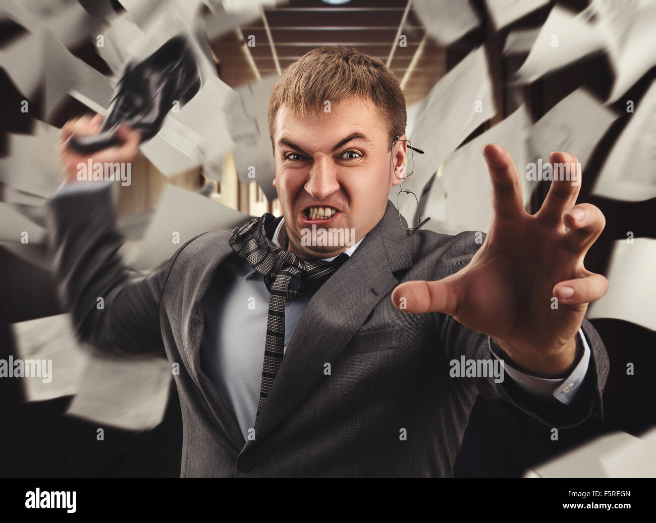 Aggressive office worker put up a fight with a shoe Stock Photo - Alamy