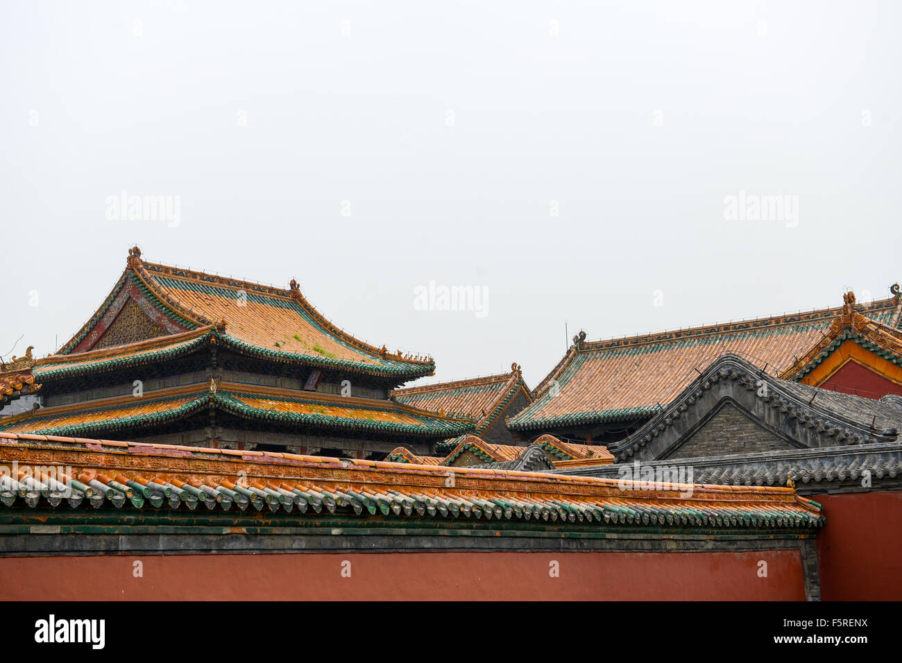 red wall and yellow roofs in ancient Chinese style Stock Photo - Alamy