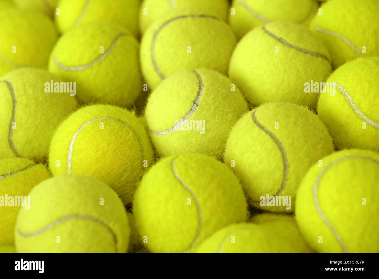 exotic yellow tennis ball as sport background Stock Photo - Alamy