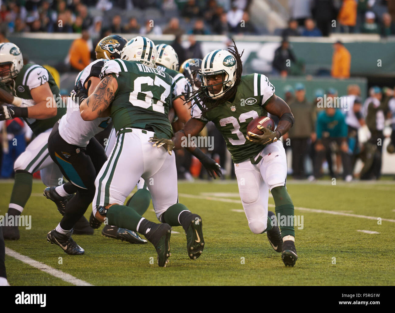 Running back with blocker hi-res stock photography and images - Alamy