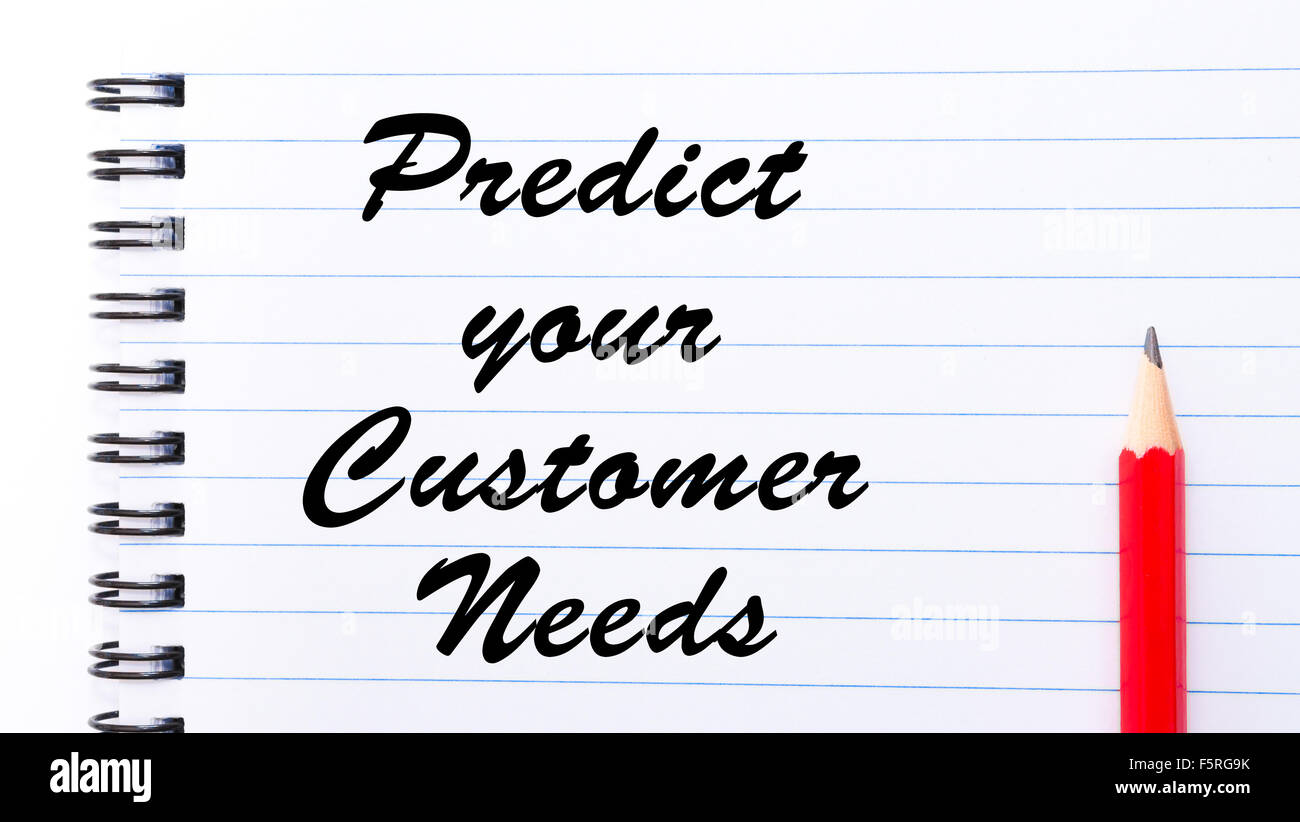 Predict Your Customer Needs written on notebook page, red pencil on the ...