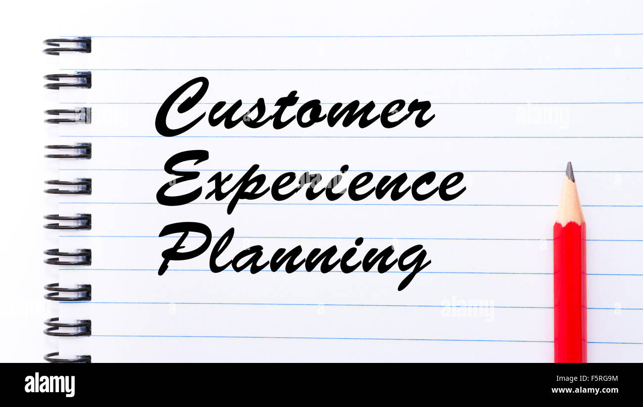 Customer Experience Planning written on notebook page, red pencil on ...