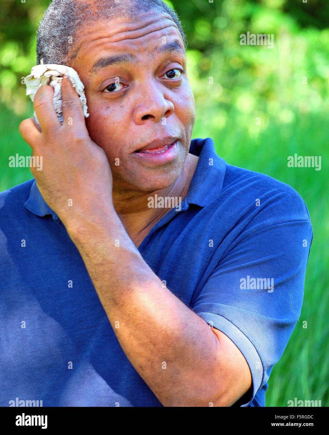 Man in summer heat outdoors Stock Photo - Alamy