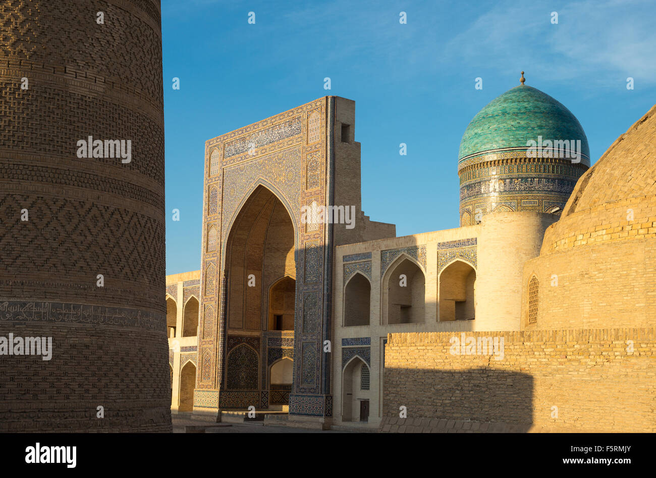 Uzbekistan, Bukhara, the Kalon minaret and the Mir-i-Arab madrassah in the background Stock ...