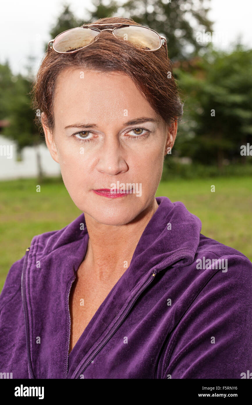 Friendly woman wearing glasses hi-res stock photography and images - Alamy
