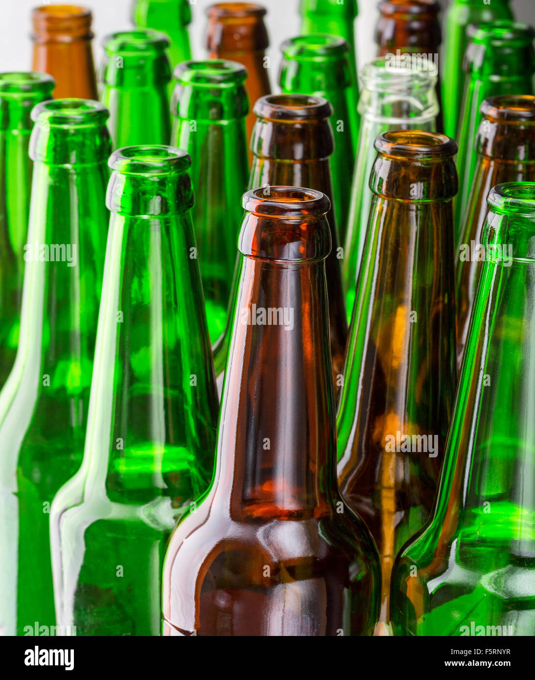 Many empty bottles in a row Stock Photo - Alamy
