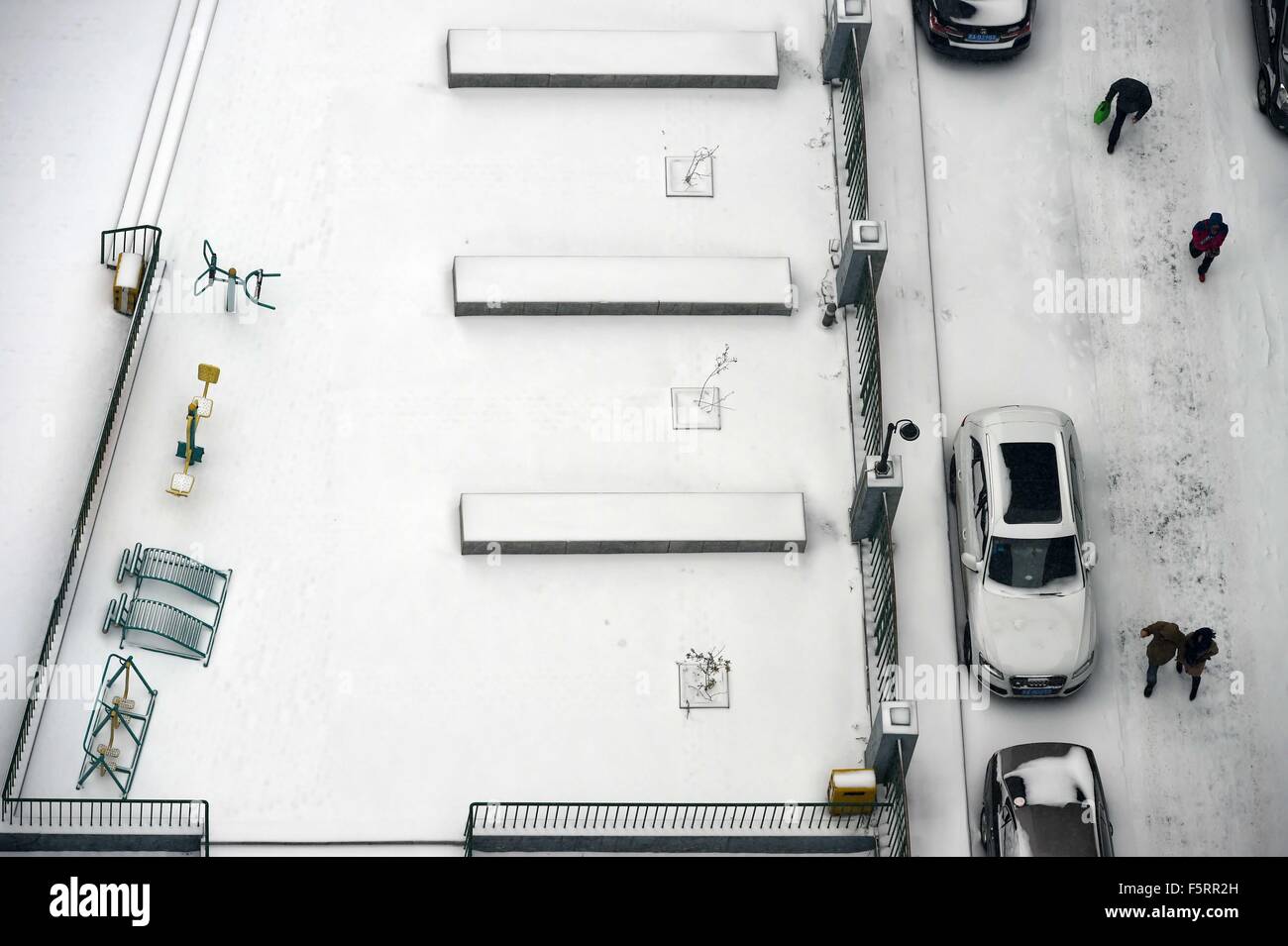 Harbin, China's Heilongjiang Province. 9th Nov, 2015. People walk in ...